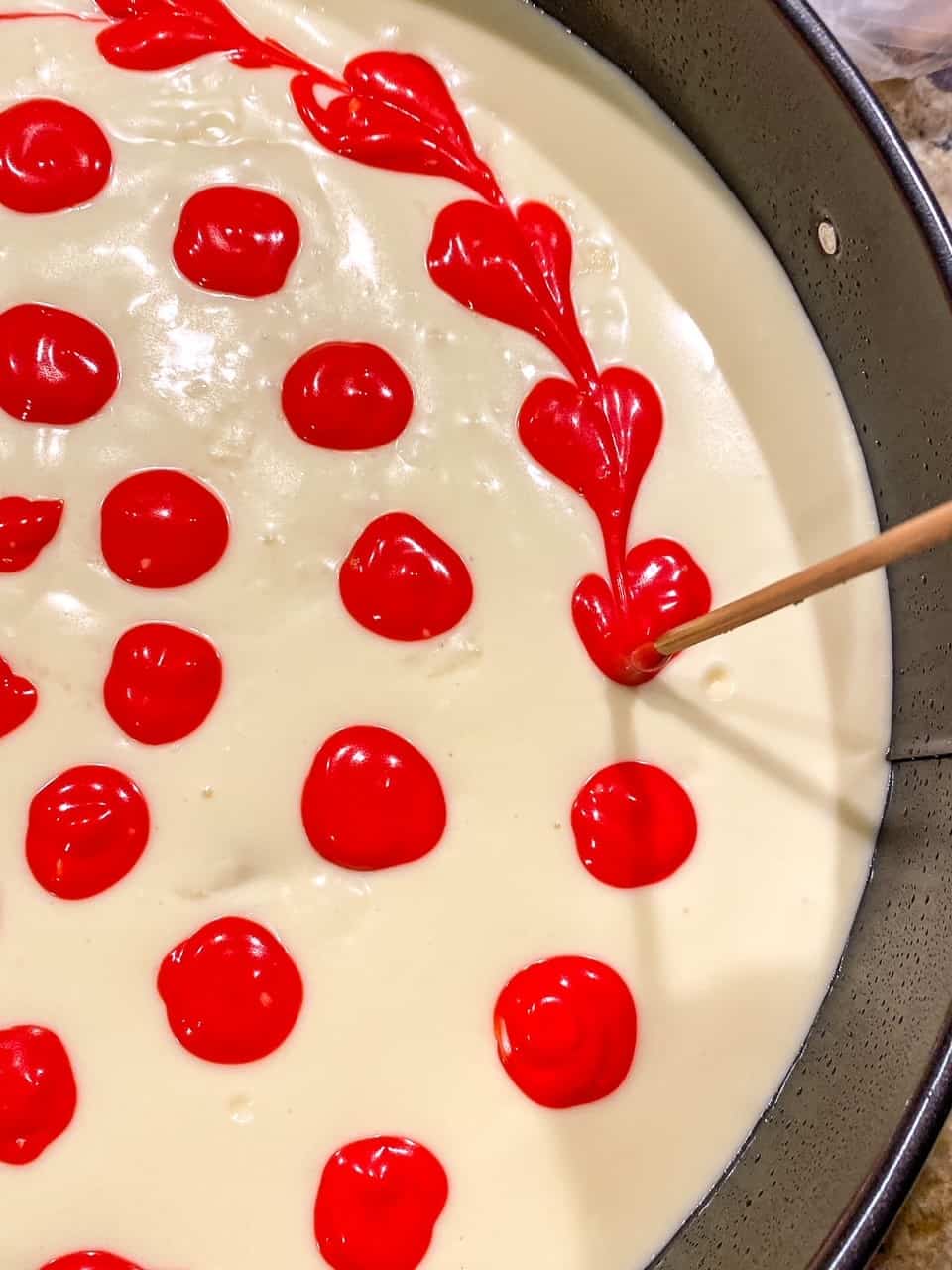 Red Velvet Swirl Cheesecake with White Chocolate - Razzle Dazzle Life