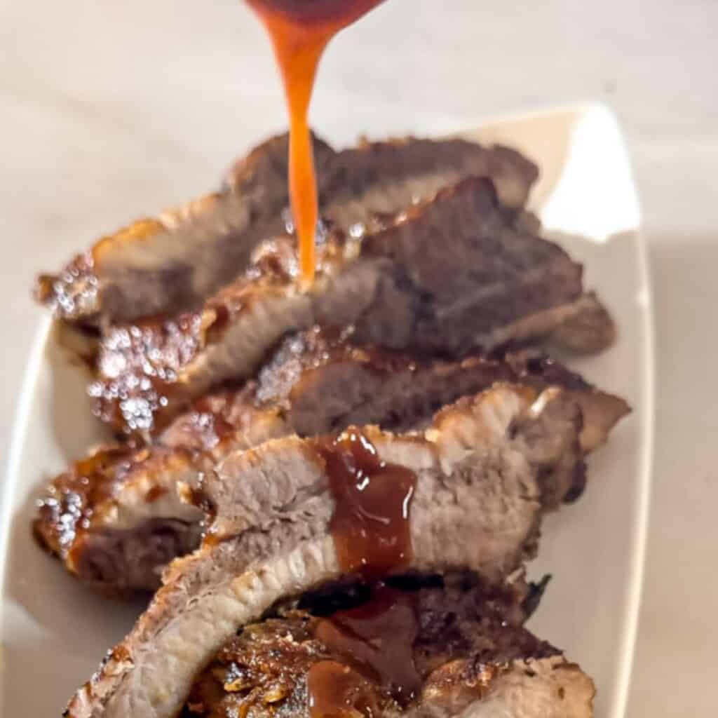 Tender Baby Back Ribs in the Oven - Razzle Dazzle Life