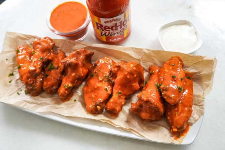 Super Crispy Oven Baked Chicken Wings in Buffalo Sauce - Razzle Dazzle Life
